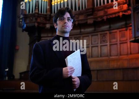 Actor Conor O'Kane holding a signed copy of the Good Friday Agreement ...