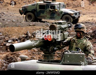 US Marines fire a TOW Missile from an M-41 Saber weapon system during ...