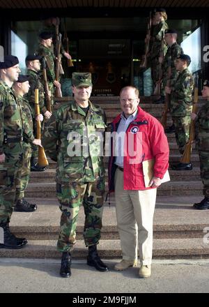 The Honorable F. Whitten Peters, Secretary of the Air Force, shakes ...