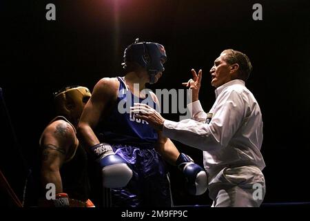 US Air Force boxer Sammy Curbelo (2nd from right) receives fight ...