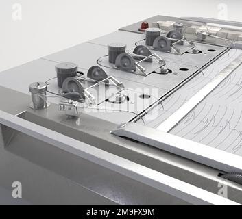 A russian polygraph lie detector machine drawing lines on graph paper ...