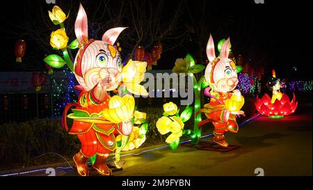 SHIYAN, CHINA - JANUARY 17, 2023 - Visitors enjoy lanterns in the shape ...