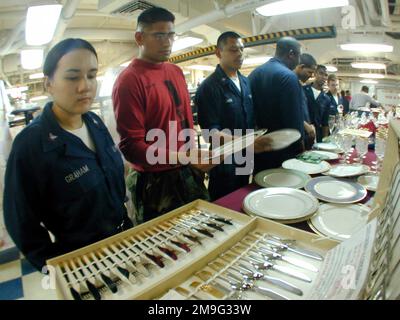 (From left to right) Aviation Ordnanceman David Dorris, Joel Kopp ...
