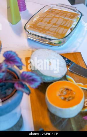 Cooking winter lasagna with fresh winter vegetables in home kitchen on ...