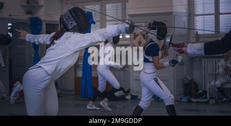 The female contestants practicing forf the International fencing cup in ...