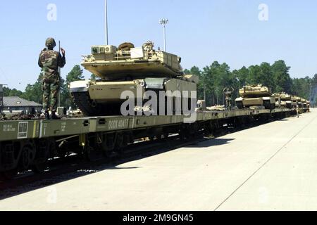 U.S. Army personnel of the 64th Armored Cavalry Regiment provide ...