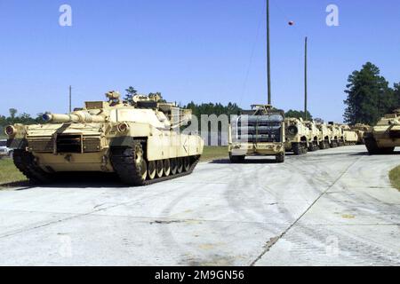 U.S. Army personnel of the 64th Armored Cavalry Regiment provide ...