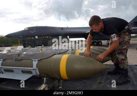 An Air Force weapons loader from the 28th Air Expeditionary Wing ...