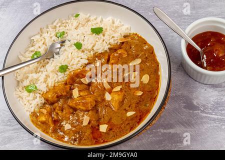 chicken korma and rice with mango chutney from above Stock Photo - Alamy