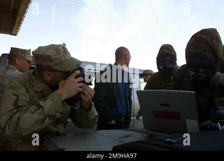 Corporal Bryant V. Cox, USMC, (left) a Combat Photographer with the ...