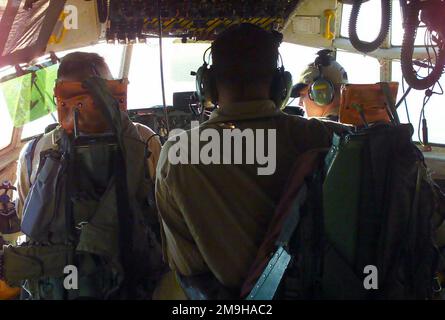 Captain Don Maraska, USMC, co-pilot (left) and Sergeant Wayne, USMC ...