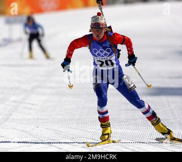 With his .22 caliber, bolt-action rifle slung on his back, World Class ...