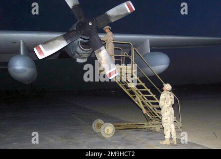 As night falls a maintenance Marine from the Marine Aerial Refueler ...