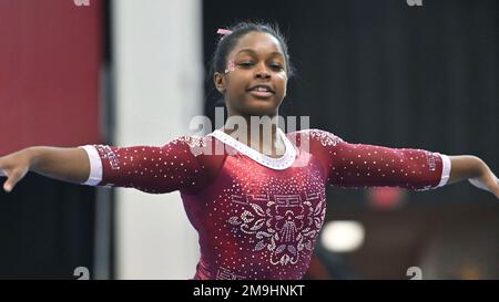 Alabama gymnast Lillian Lewis competes on the beam against Arkansas ...