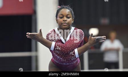 Alabama gymnast Lillian Lewis competes on the beam against Arkansas ...