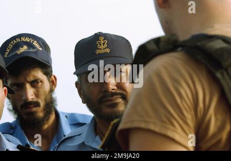 US Navy Reuben James, Visit Board Search and Seizure (VBSS) team give a ...