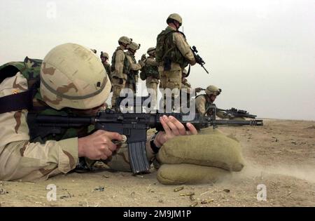 At a live fire range near Bagram Airfield, Sergeant (SGT) Joe Gonzalez ...