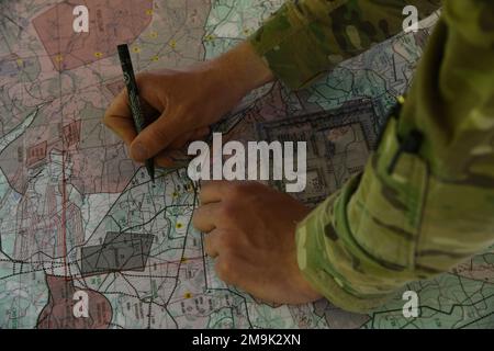 A U.S. Army Soldier points and fires his SIG Sauer P320-M17, semi ...