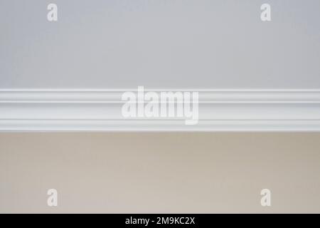 Detail of a flat ceiling skirting Stock Photo - Alamy