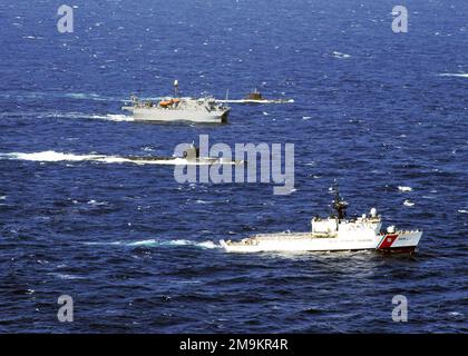 An armada of US Navy (USN) Ships steam in formation during an exercise ...