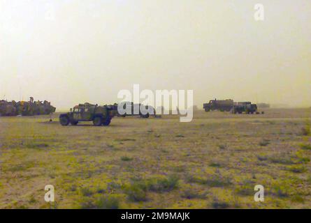 U.S. Marines prepare to load a High Mobility Artillery Rocket System ...
