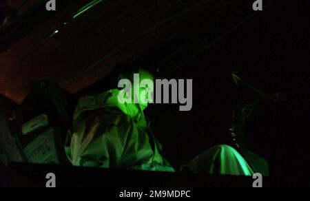 A US Air Force (USAF) crewchief assigned to the 410th Air Expeditionary ...