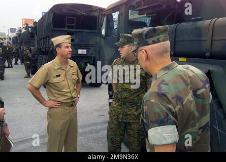 U.S. Marine Corps Col. Thomas Savage (right), commanding officer ...