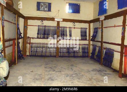 The interior of an Iraqi Armory in Al Kut with racks filled with Tabuk ...