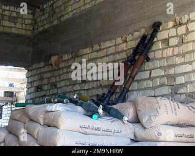 Iraqi RPG-7 portable rocket launchers and an AKM assault rifle are ...