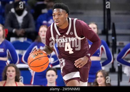 Texas A&M's Wade Taylor IV reaches for a loose ball during an NCAA ...