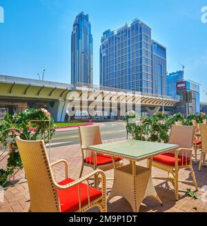 DUBAI, UAE - MARCH 6, 2020: The terrace of outdoor cafe with Coca-Cola ...