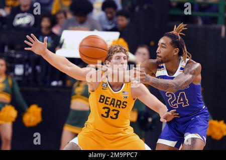 McNeese State forward Christian Shumate, right, drives the ball inside ...