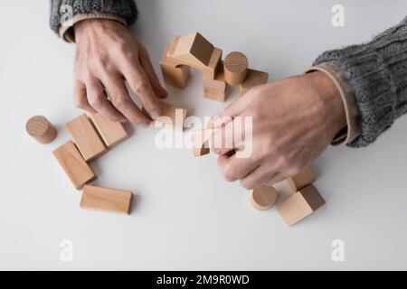 top view of cropped man with alzheimer syndrome near purple ribbon and ...