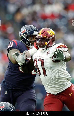 Washington Commanders defensive end Efe Obada (97) on the sideline ...