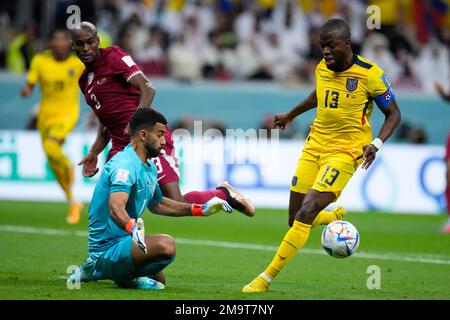 Qatar's goalkeeper Saad Al Sheeb saves on an attempt to score by ...