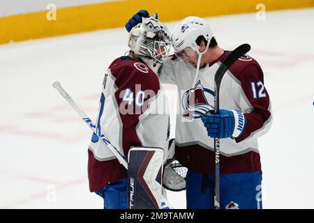 Colorado Avalanche center Jayson Megna, right pursues the puck while ...