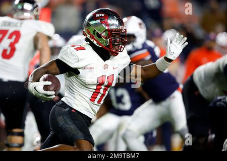 Western Kentucky receiver Malachi Corley, right, runs after a catch as ...