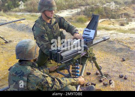 A U.S. Marine with 2nd Marine Division prepares to launch an XMQ-13 ...