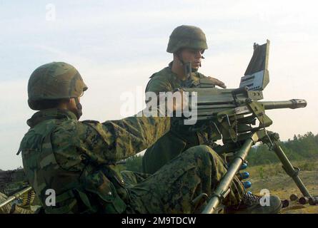 A U.S. Marine with 2nd Marine Division prepares to launch an XMQ-13 ...