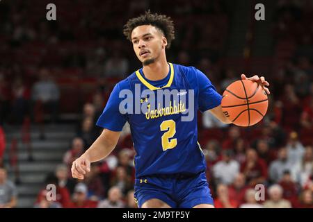South Dakota State guard Zeke Mayo (2) tries to get past Arkansas guard ...