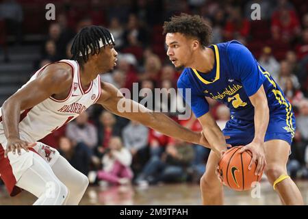 South Dakota State guard Zeke Mayo (2) tries to get past Arkansas guard ...