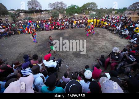 Gule Wamkulu dance secretive society members in gory masks and colorful ...