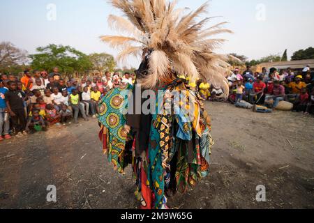 Gule Wamkulu dance secretive society members in gory masks and colorful ...