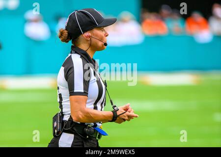 NFL back judge Robin DeLorenzo walks on the field during an NFL ...