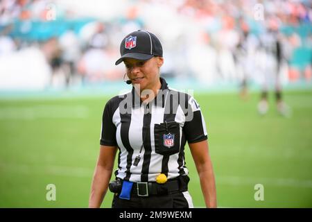 NFL back judge Robin DeLorenzo walks on the field during an NFL ...