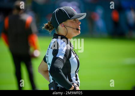 NFL back judge Robin DeLorenzo walks on the field during an NFL ...