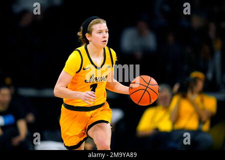 Iowa guard Molly Davis drives up court during an NCAA college ...