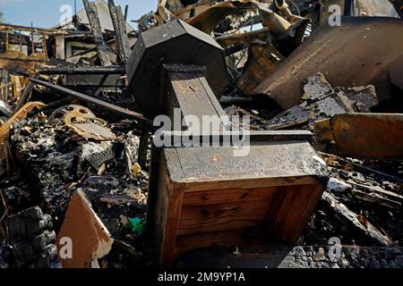 Burned insulation, charred wooden beams, melted musical instruments and ...
