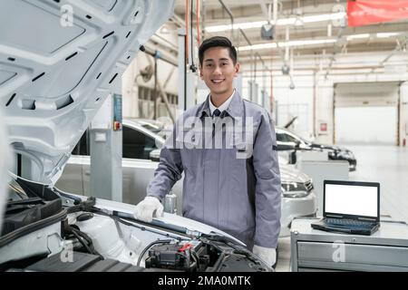 Repair shop mechanics researchers Stock Photo - Alamy