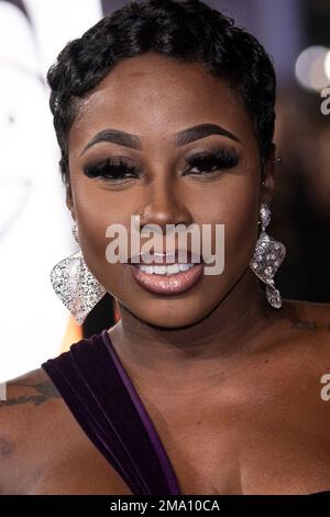 Esther Falana poses for photographers upon arrival for the premiere of ...